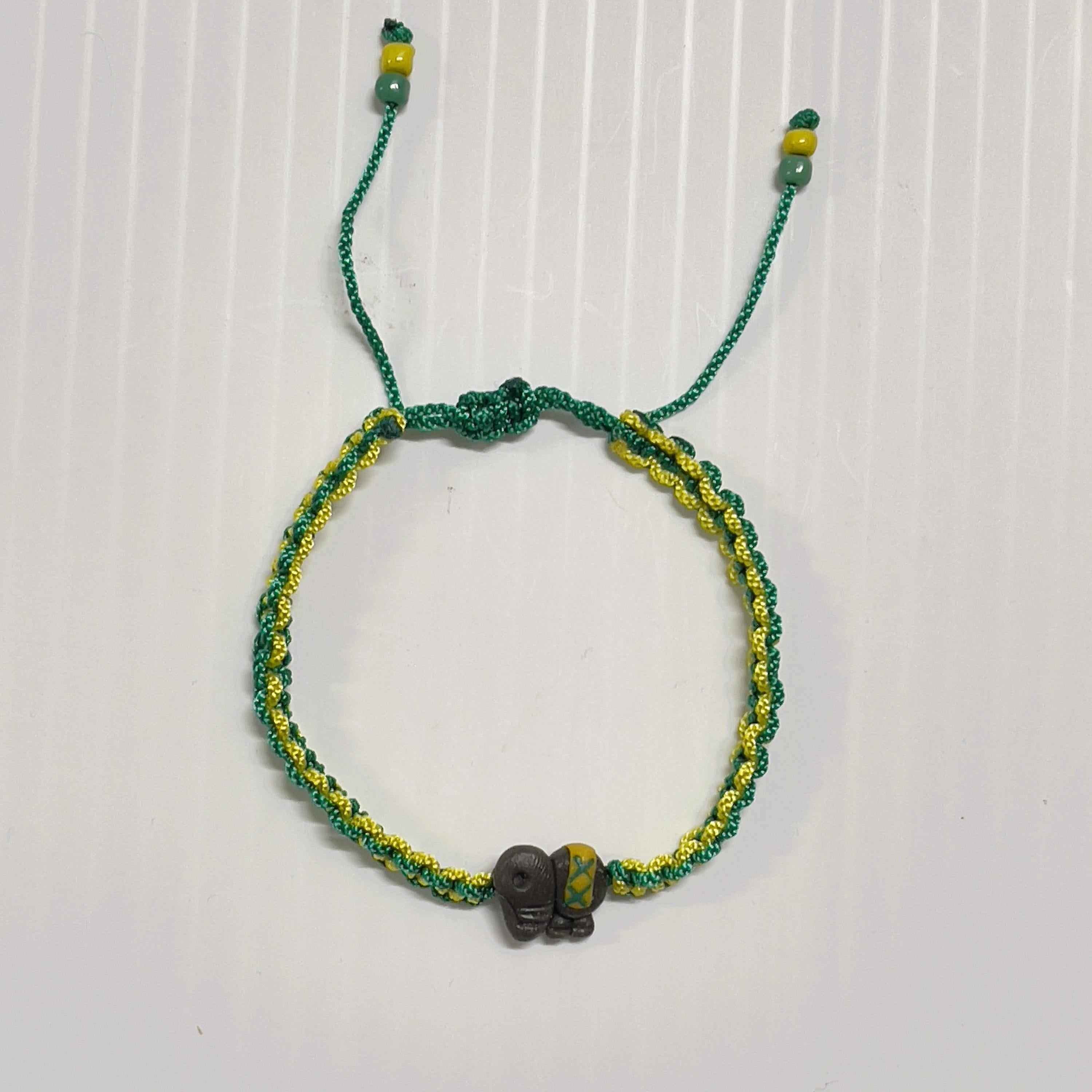 Ifa string with elephant